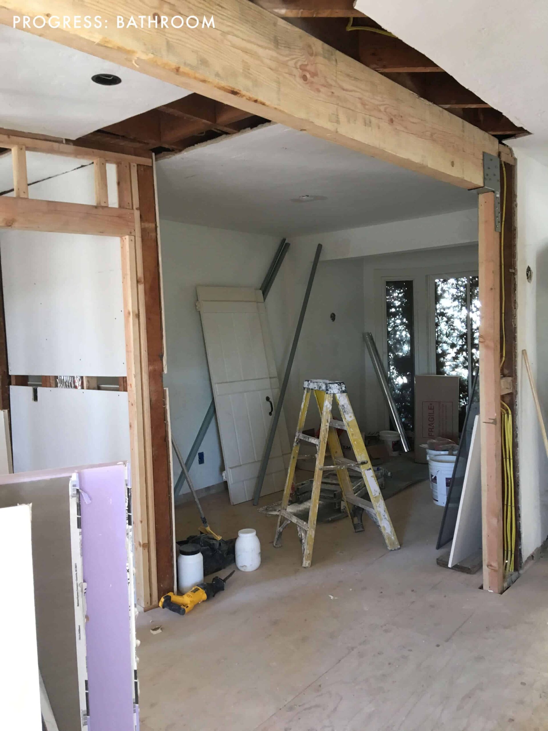 progress_living_entry_demo_bathroom - Emily Henderson