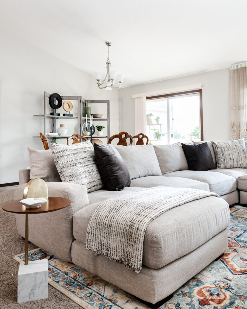 How Lea Created A Warm & Inviting Living Room For Her Neighbor's Multi ...