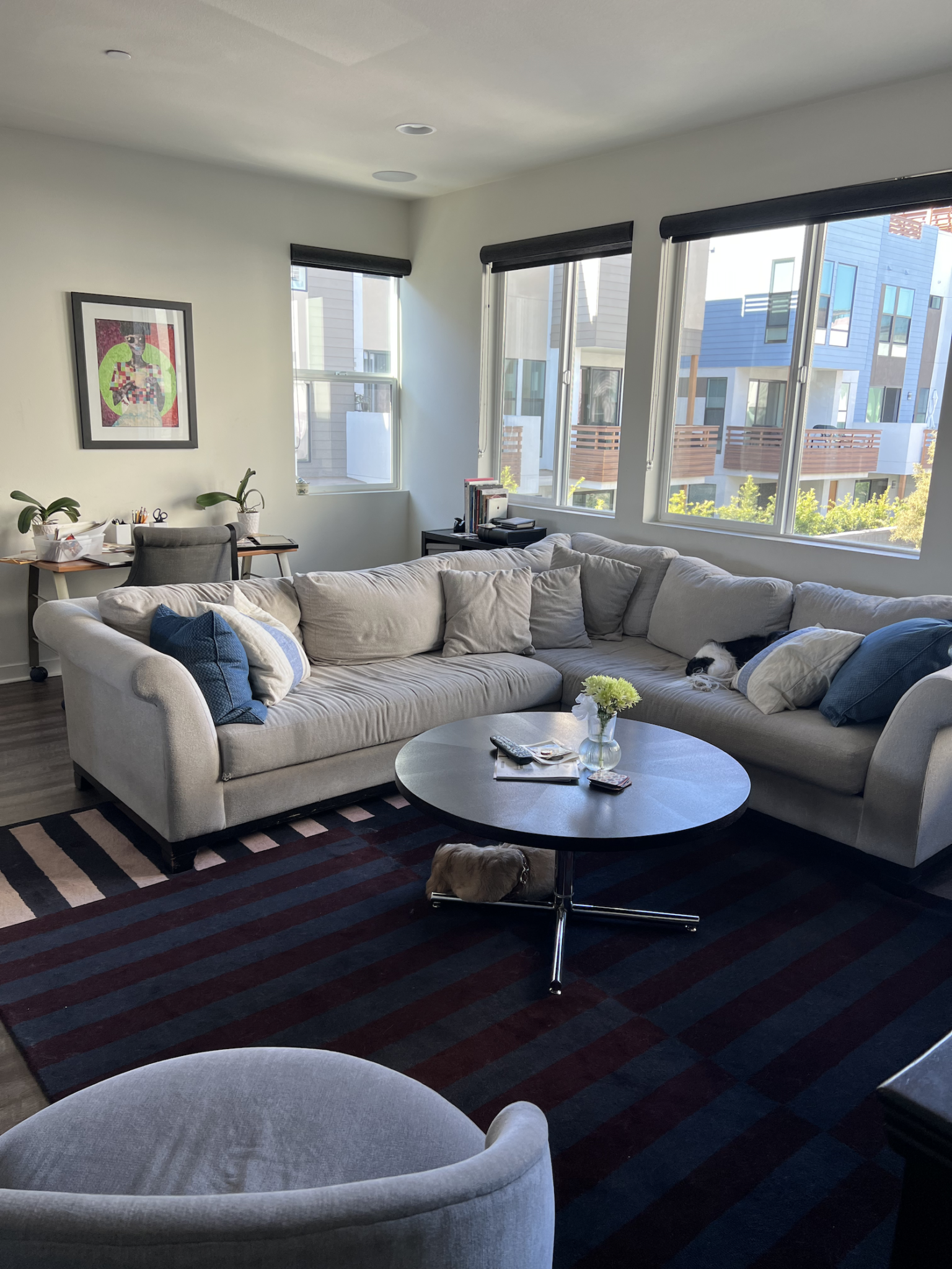 How Mallory Warmed Up A Living Room With Gray Vinyl Flooring - Emily ...